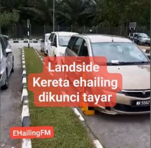 Sejarah : kereta ehailing di Landside dikunci tayar – Dunia E-Hailing & P-Hailing